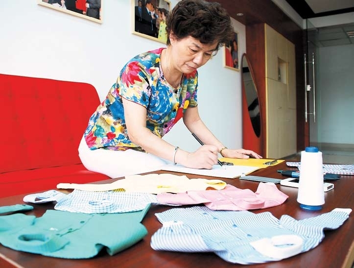 Xu still has designs on shirts after 30 years--嘉定报